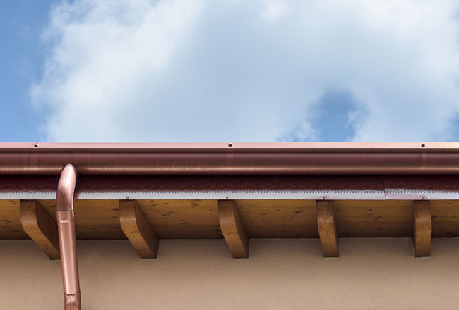 A Head-to-Head Comparison of Copper and Aluminum Rain Gutters | Empire ...